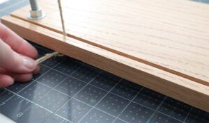 How to Setup & Use a Sewing Frame for Bookbinding